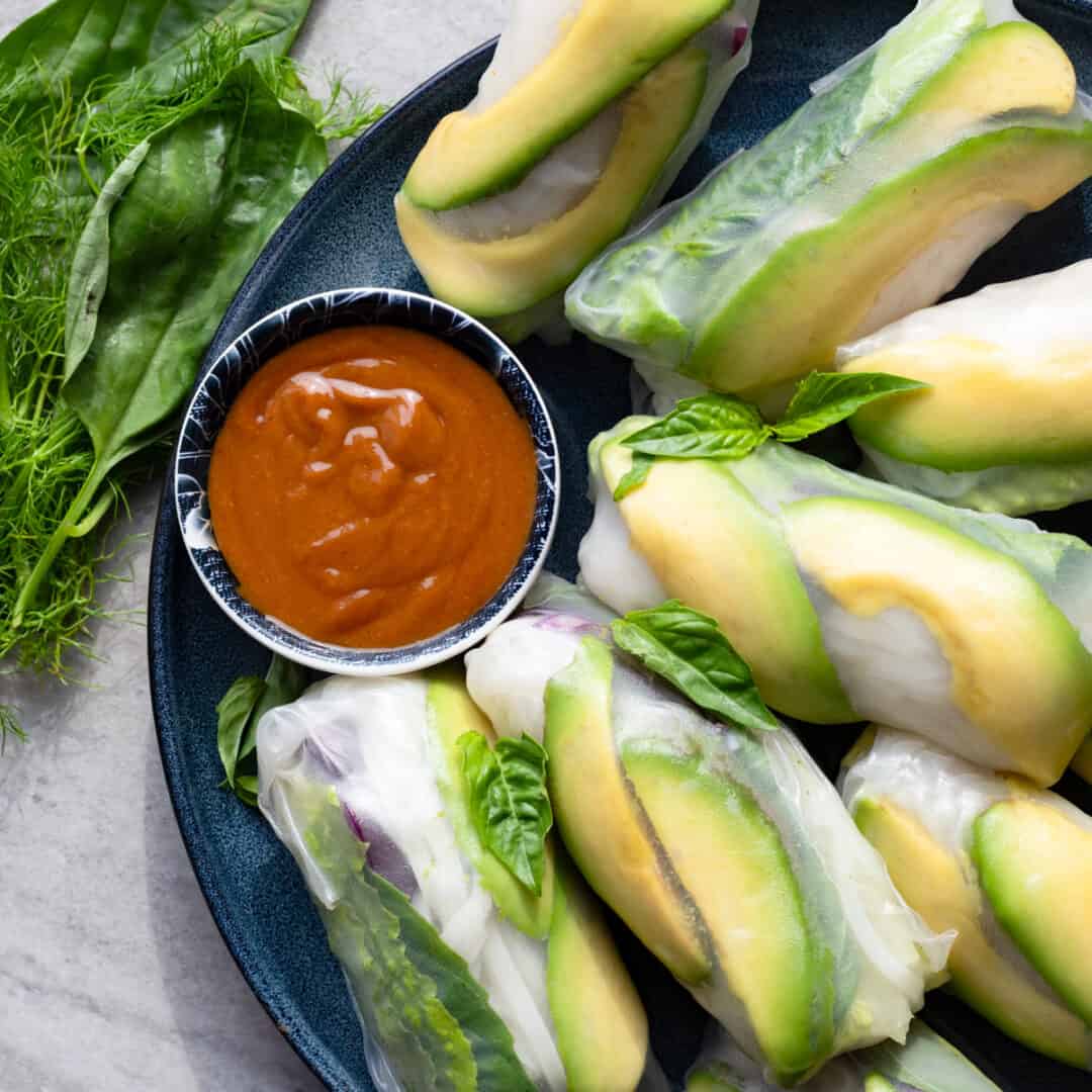 Avocado Spring Rolls with Zesty Thai Peanut Sauce - AtMyTable